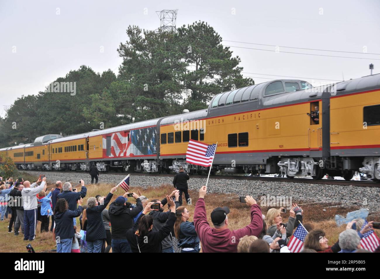 (181206) -- HOUSTON, Dec. 6, 2018 -- People line up along the train ...