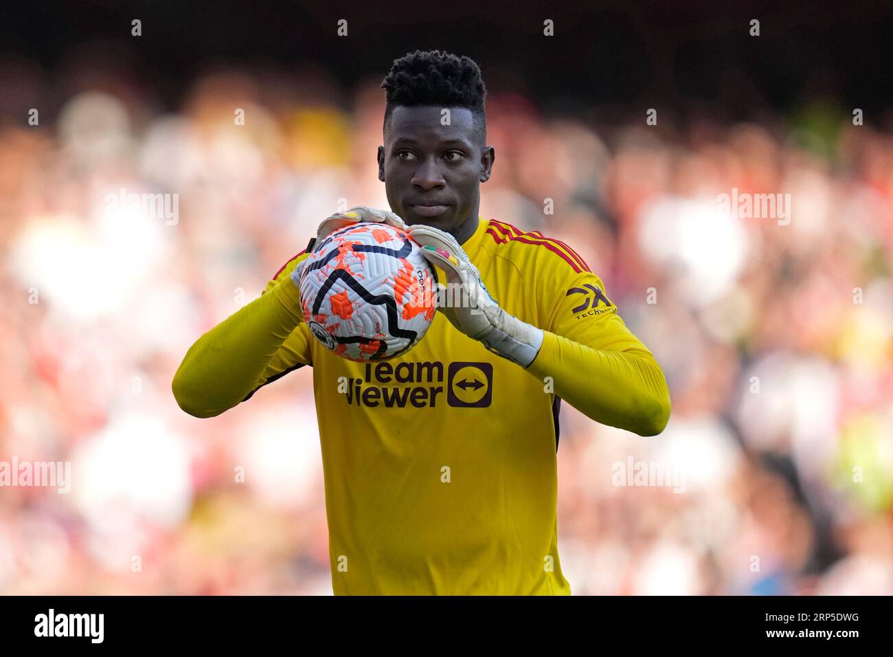 Manchester United's goalkeeper Andre Onana reacts after a penalty ...