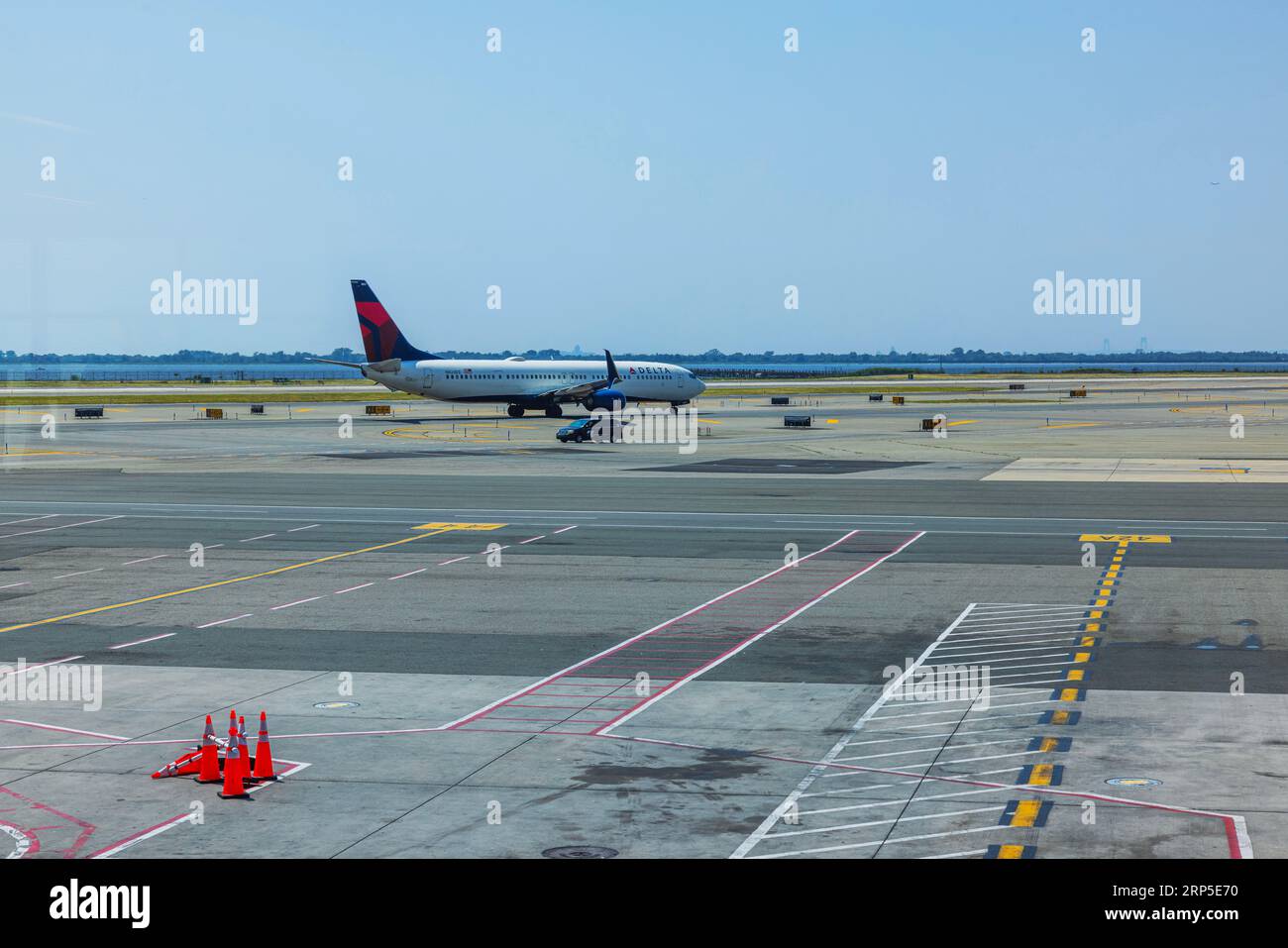 Beautiful view of airport runway with Delta airline plane getting ready ...