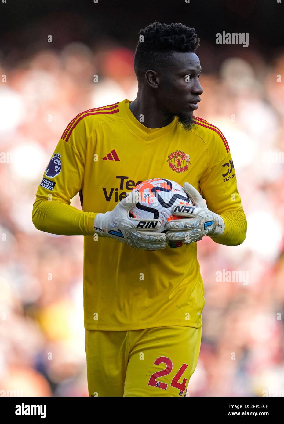 Manchester United's goalkeeper Andre Onana reacts after a penalty ...