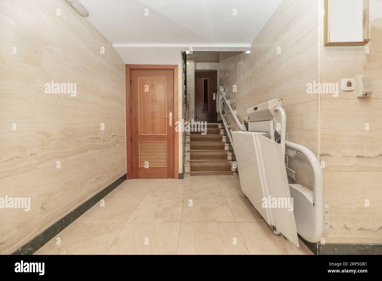 Access portal to a residential building with an elevator to save stairs ...