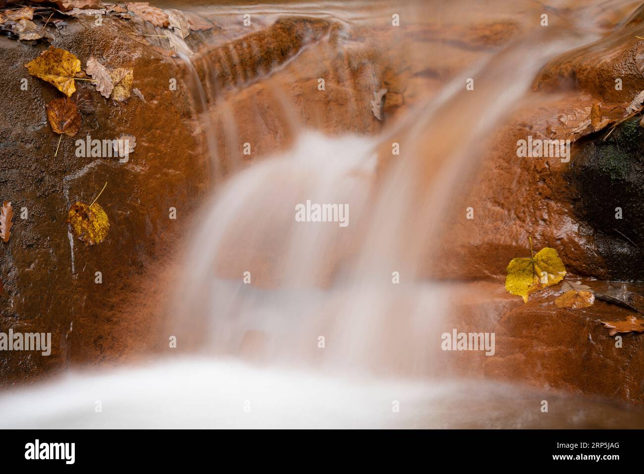 A waterfall near Coalbrookdale, Ironbridge in Autumn with eddy pools ...