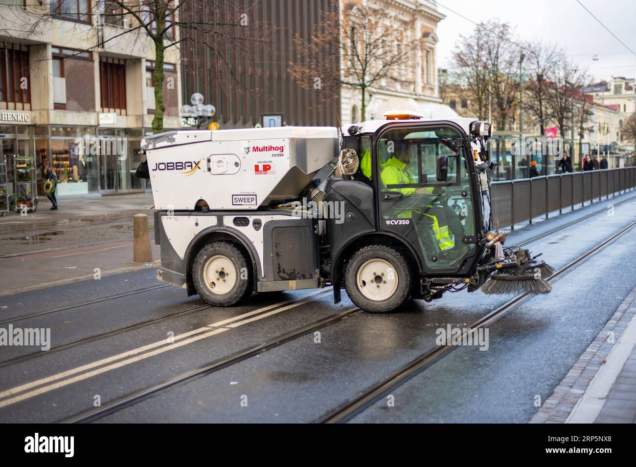 Gothenburg, Sweden - november 06 2022: Multihog street sweeper cleaning ...
