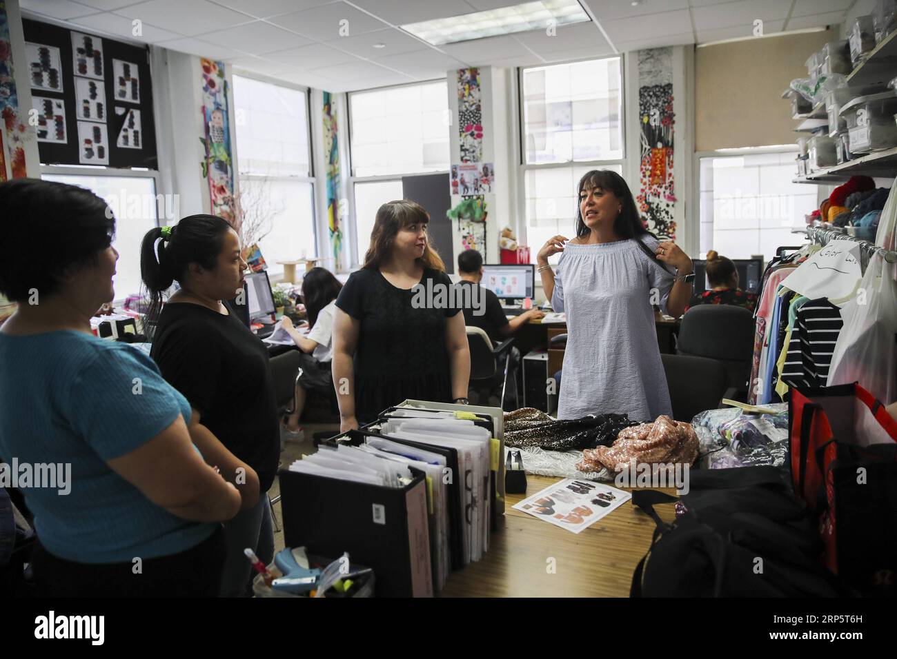 (181223) -- NEW YORK, Dec. 23, 2018 -- Staff members discuss the design ...