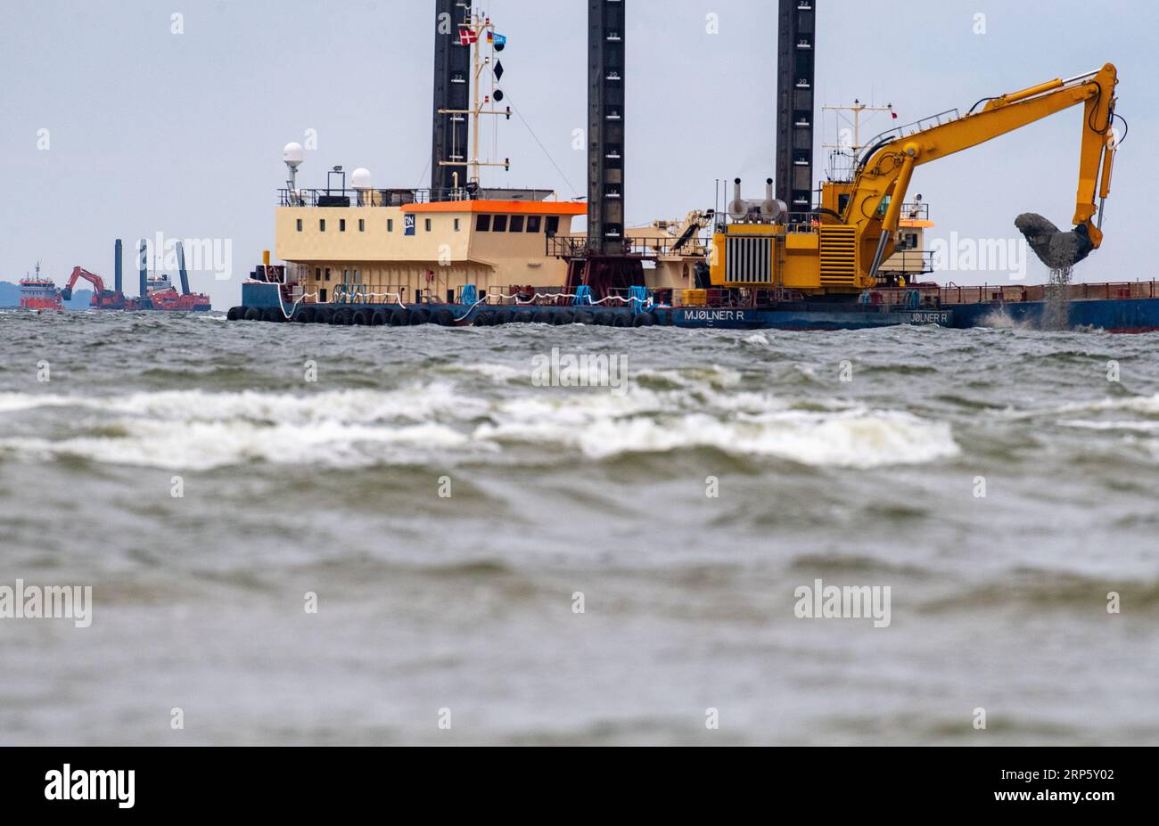 Lubmin, Germany. 03rd Sep, 2023. Excavators work in front of the ...