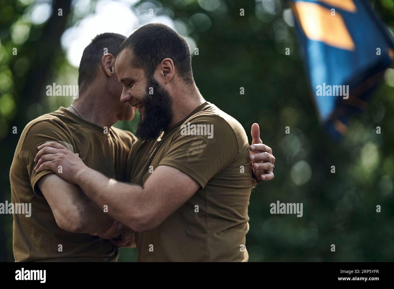 Soldiers of Ukraine's 3rd Separate Assault Brigade greet each other ...