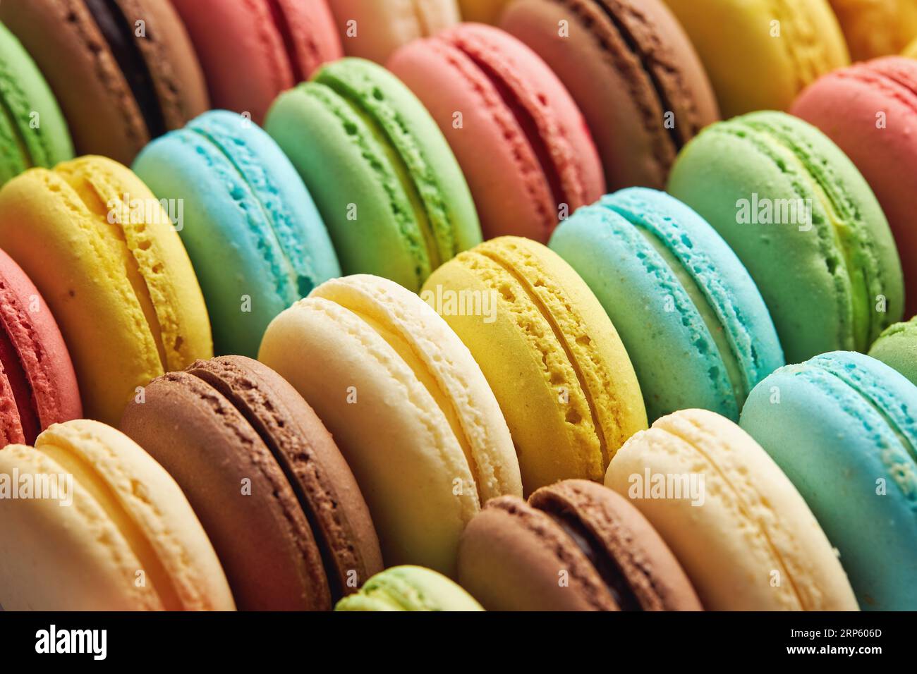 French colorful macarons background. Variety of colorful french sweet ...
