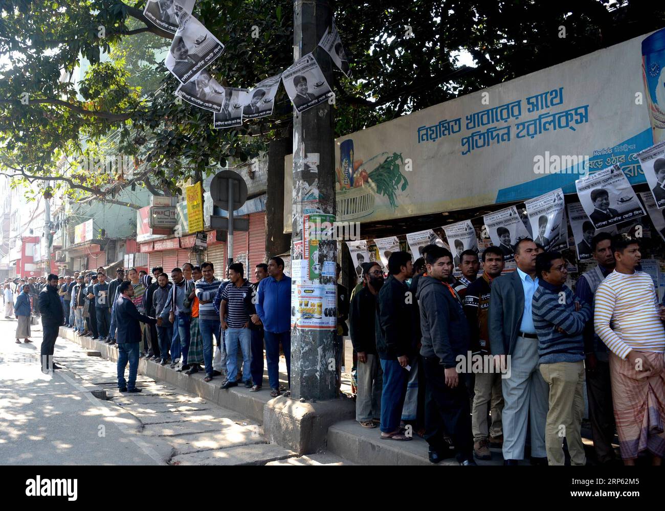 (181231) -- BEIJING, Dec. 31, 2018 -- Voters line up at a polling ...