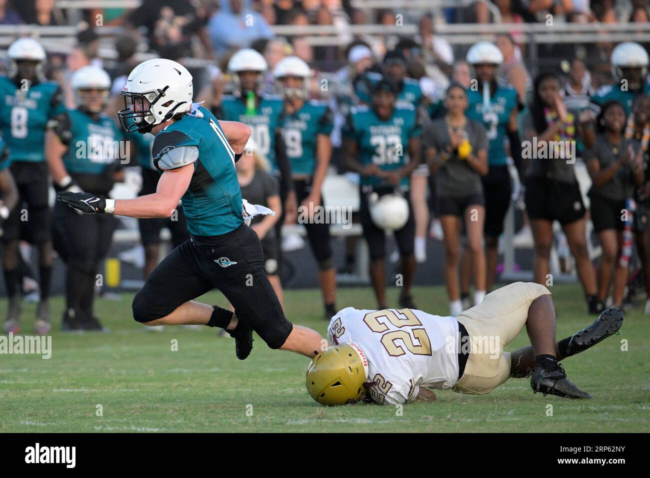 Olympia receiver Matthew Methven (11) is tackled by Wekiva linebacker ...