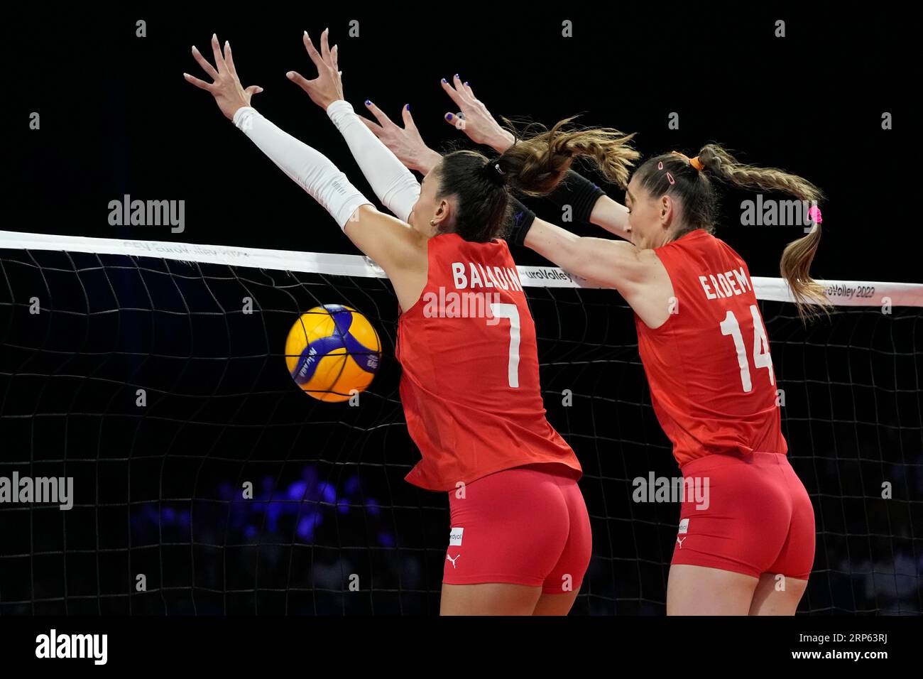 Turkey's Hande Baladin, left, Turkey's Eda Erdem Dundar go up for a ...