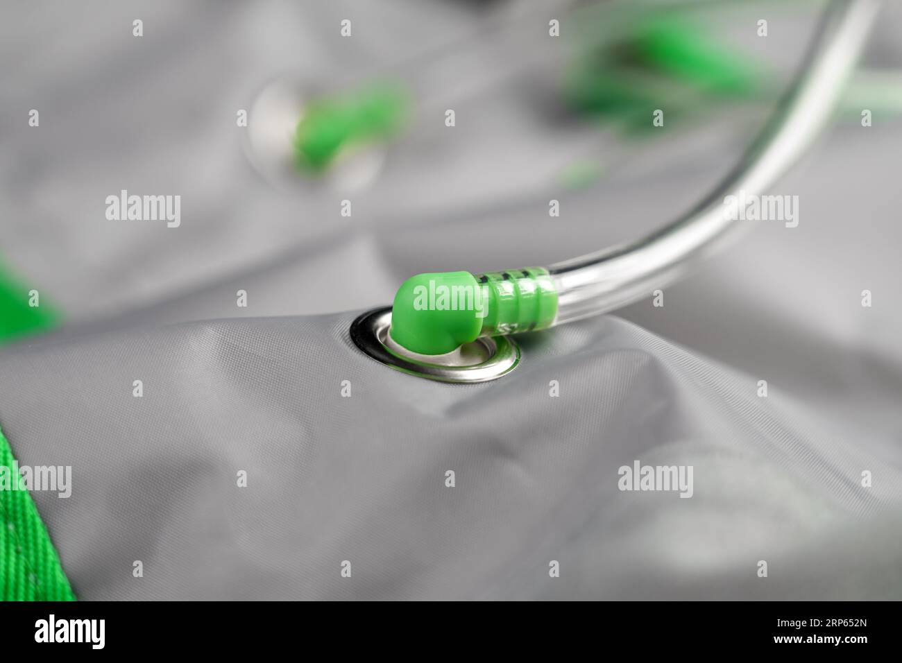 Pneumatic fitting connected to a plastic air tube. Close up Stock Photo ...