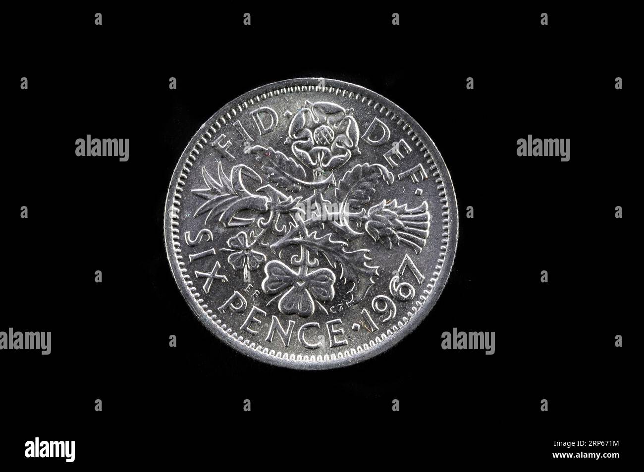 Six pence coin of pre-decimal currency, pounds, shillings and pence ...