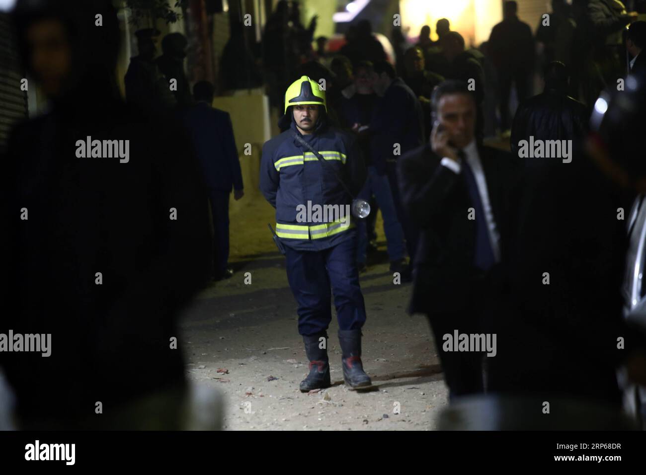 (190106) -- CAIRO, Jan. 6, 2019 -- A firefighter works at the scene ...