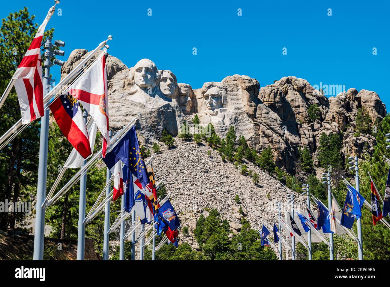 USA State Flags line entrance to Mount Rushmore National Memorial ...