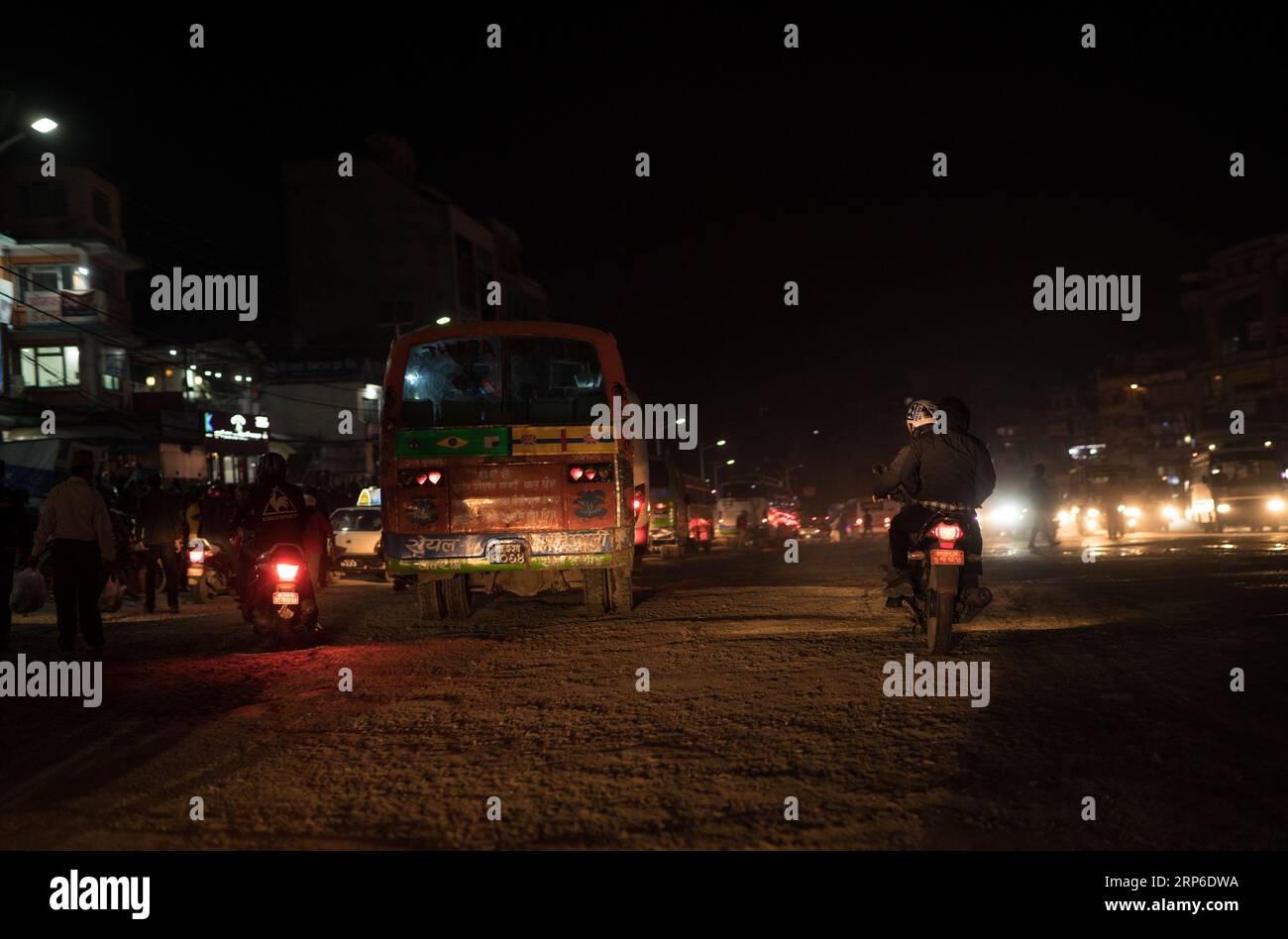 Kathmandu, - Nepal, October 25, 2019: Night traffic buses and moto ...
