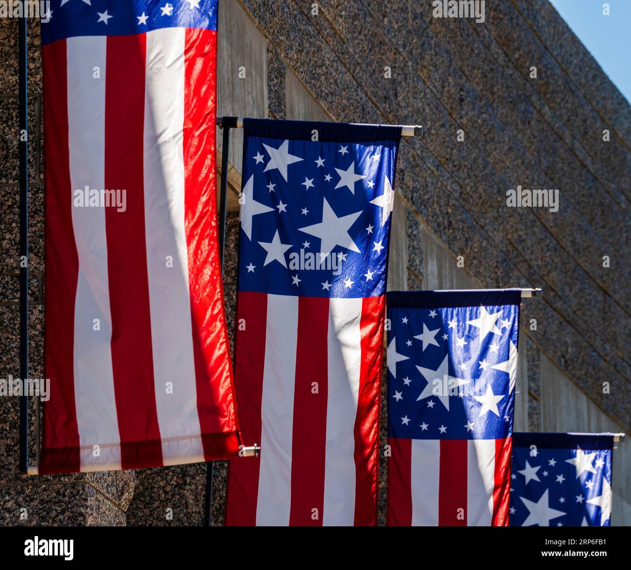 American Flags line entrance to Mount Rushmore National Memorial; Black ...