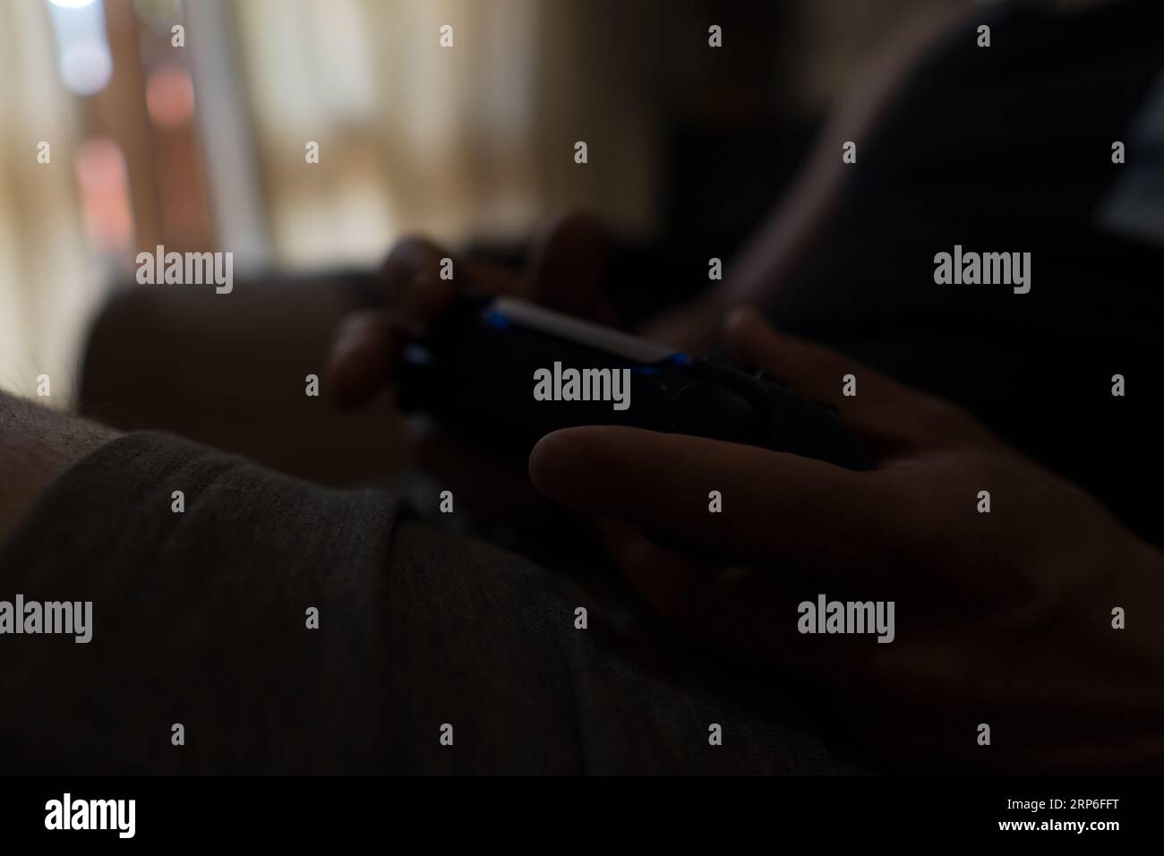 Human playing videogames Stock Photo - Alamy