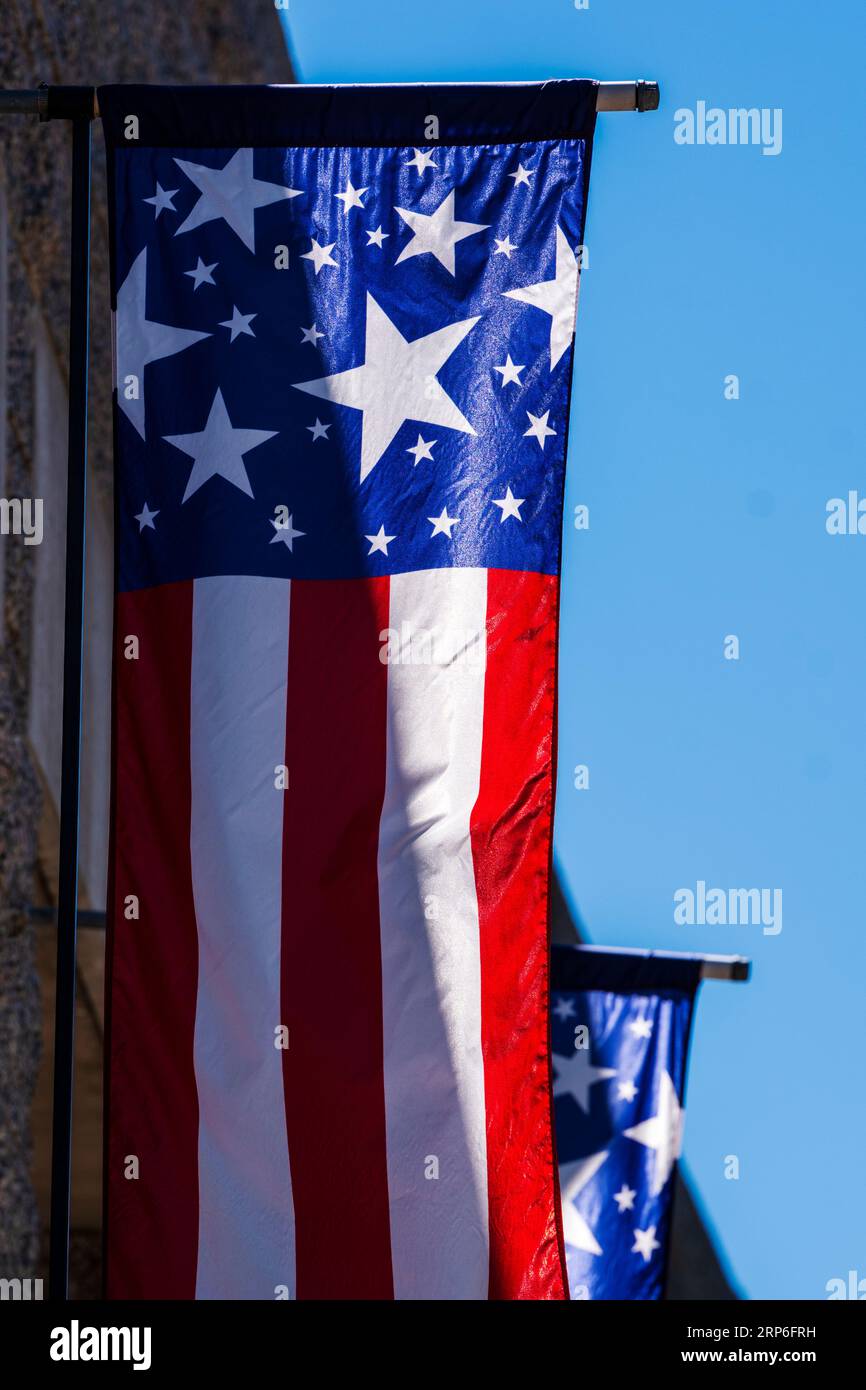 American Flags line entrance to Mount Rushmore National Memorial; Black ...