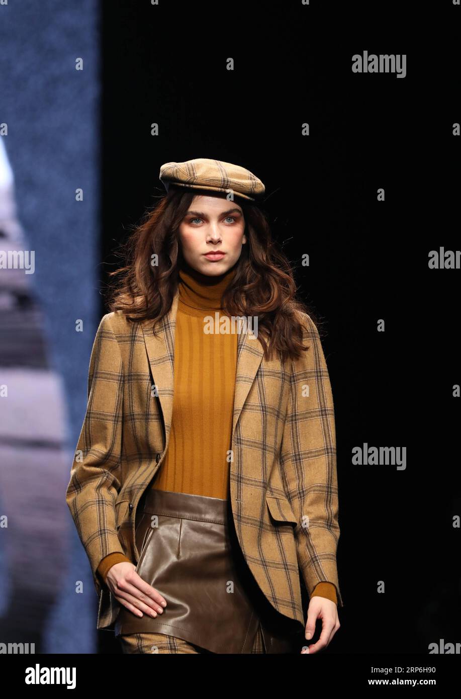 (190113) -- MILAN, Jan. 13, 2019 -- A model presents a creation for ...