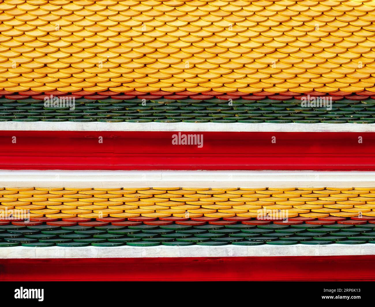 colorful roof of a temple. The roof is made up of rows of overlapping ...