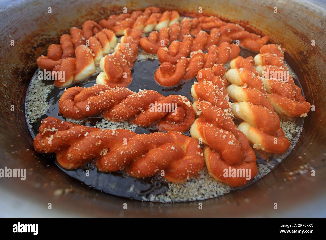 Mahua, a traditional Chinese food is fried in oil, North China Stock Photo - Alamy