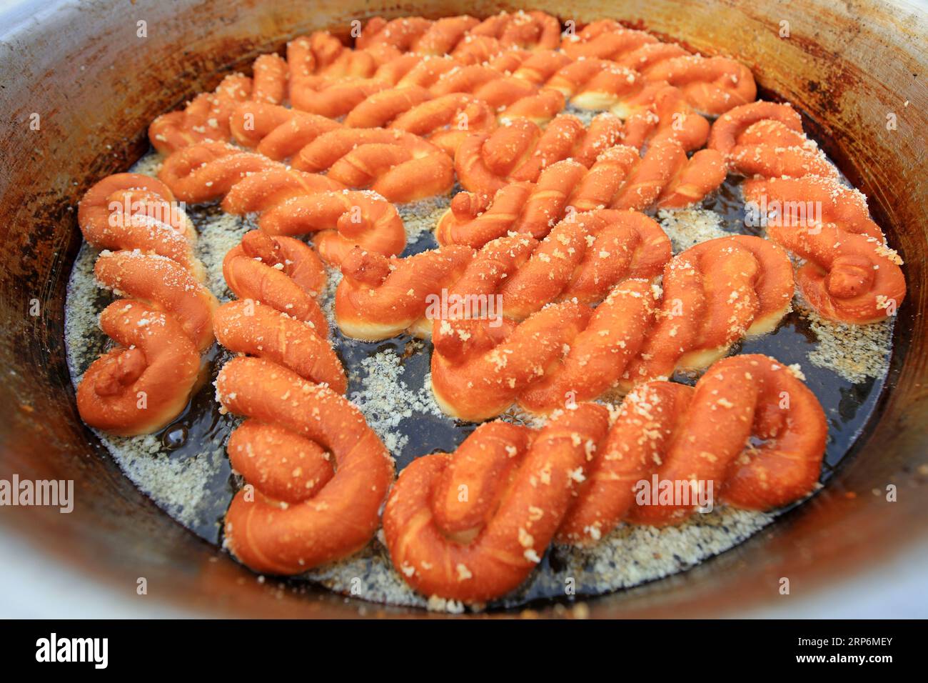 Mahua, a traditional Chinese food is fried in oil, North China Stock ...