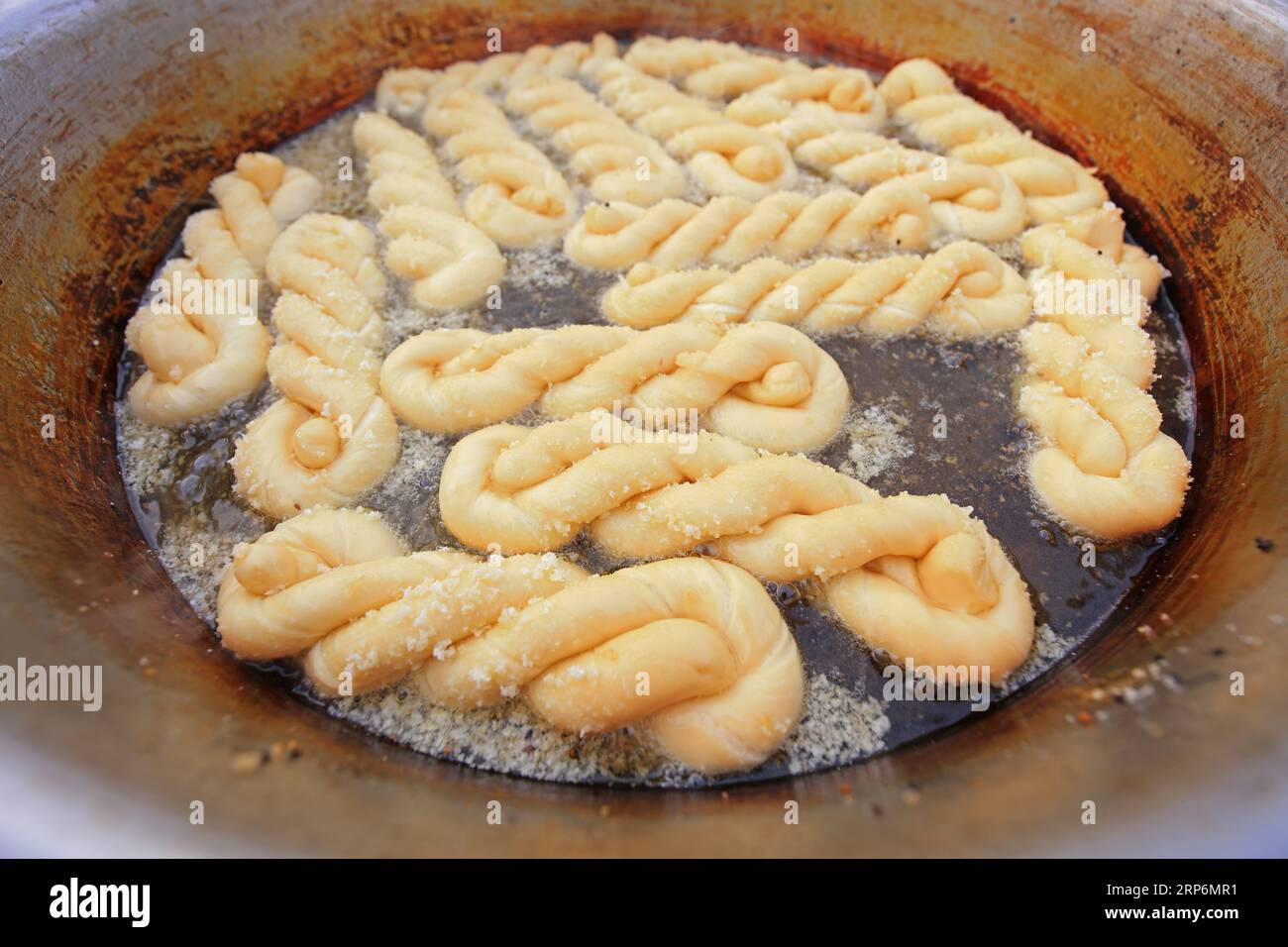 Mahua, a traditional Chinese food is fried in oil, North China Stock ...
