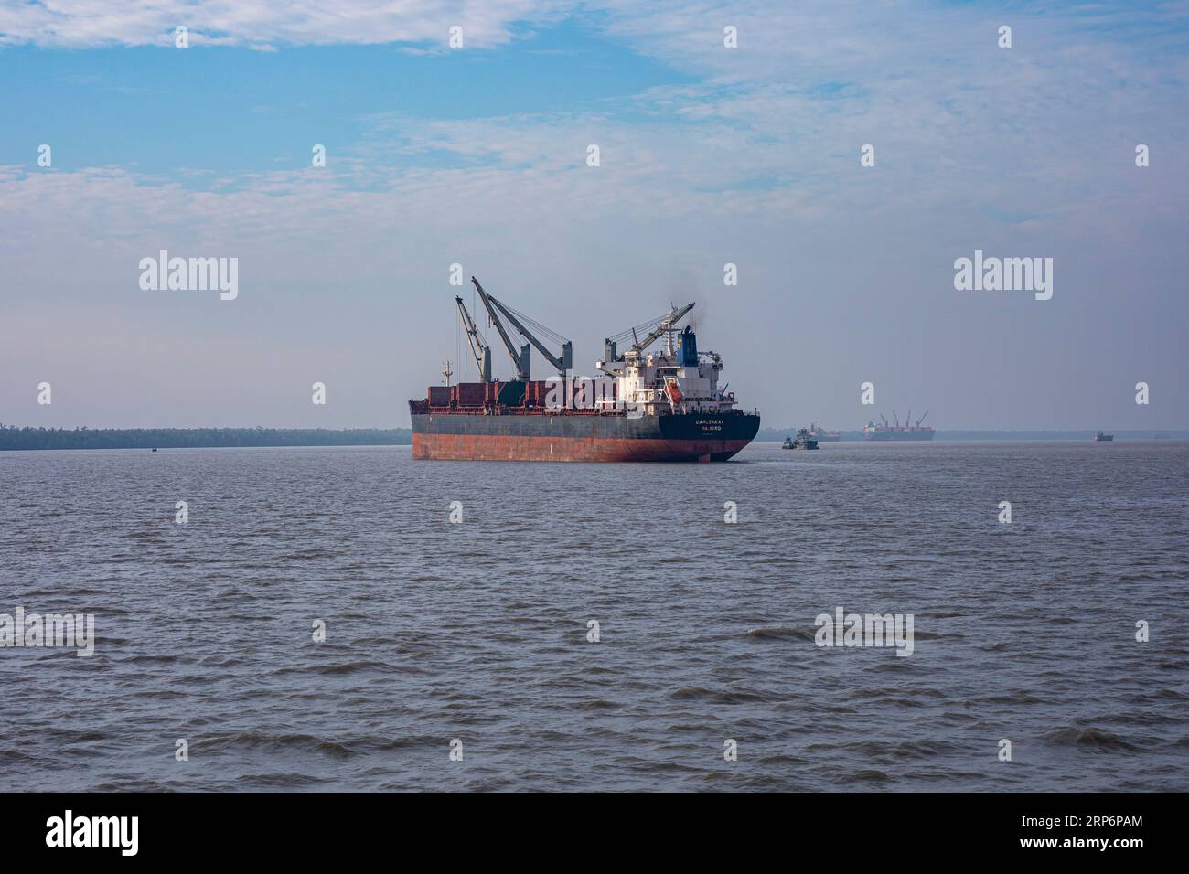 A foreign vessel anchored on the Pashur River on the outer anchorage of Mongla Port. This is the ...