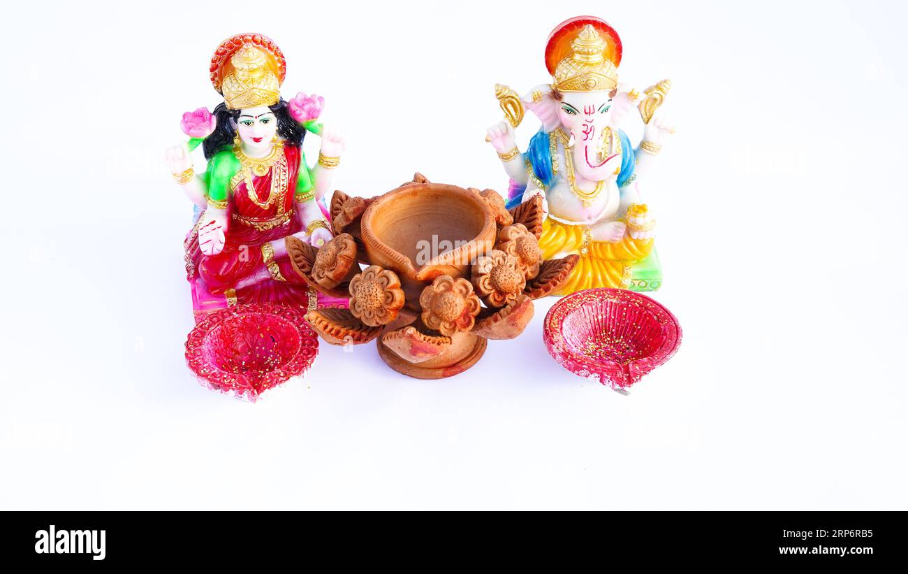 Indian God idol or statue isolated on white. Maa laxmi with Lord ...