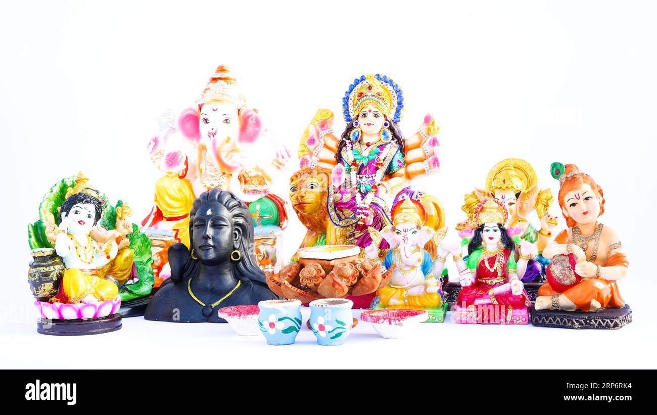 Indian God idol or statue isolated on white. Maa laxmi with Lord ...