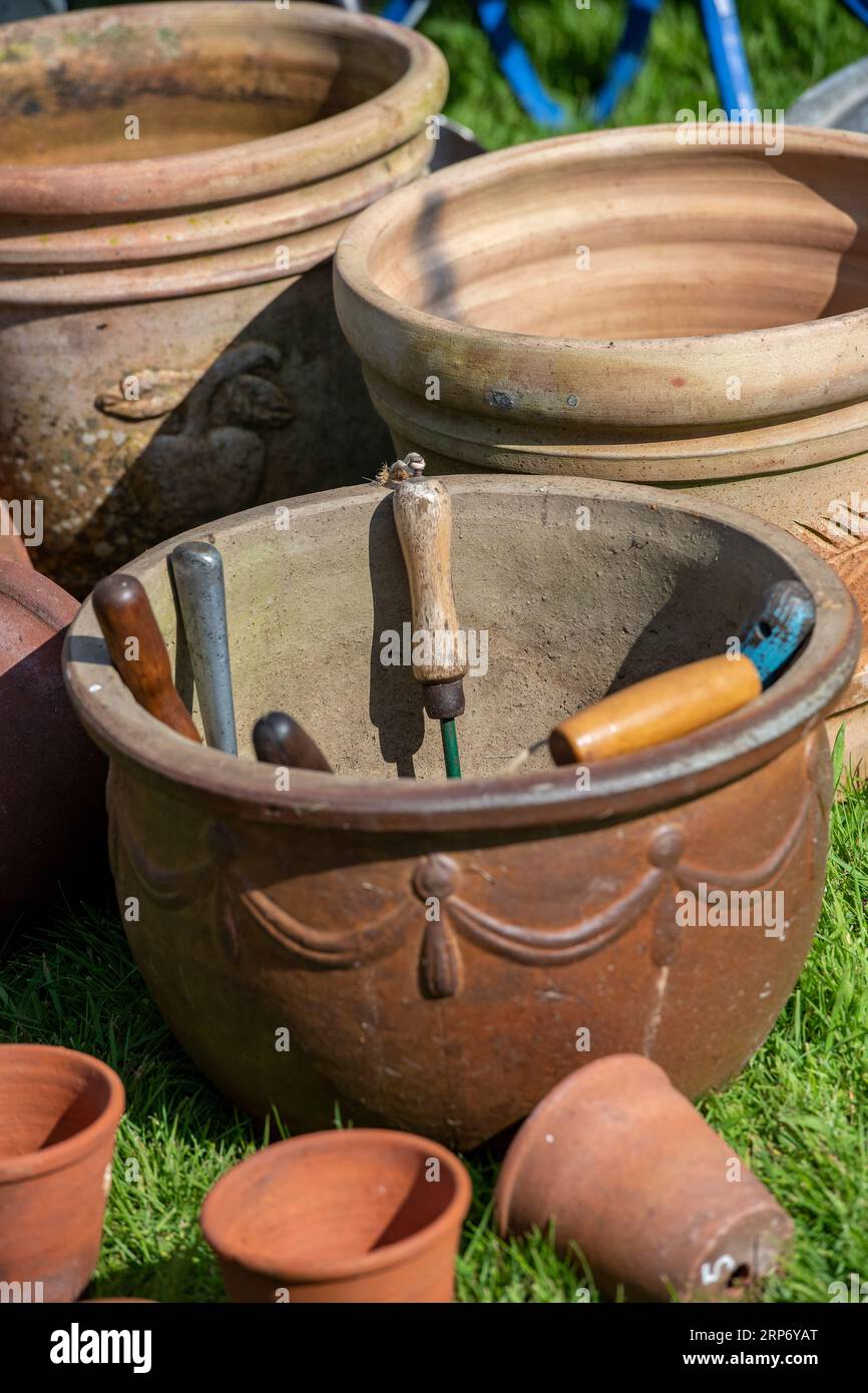 selection of large terracotta garden pots and planters with gardening ...