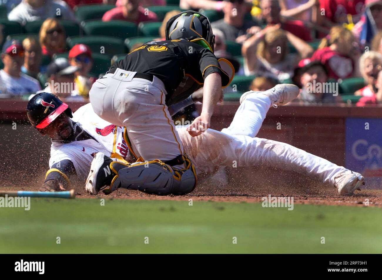 St. Louis Cardinals' Jordan Walker, rear, scores past Pittsburgh ...