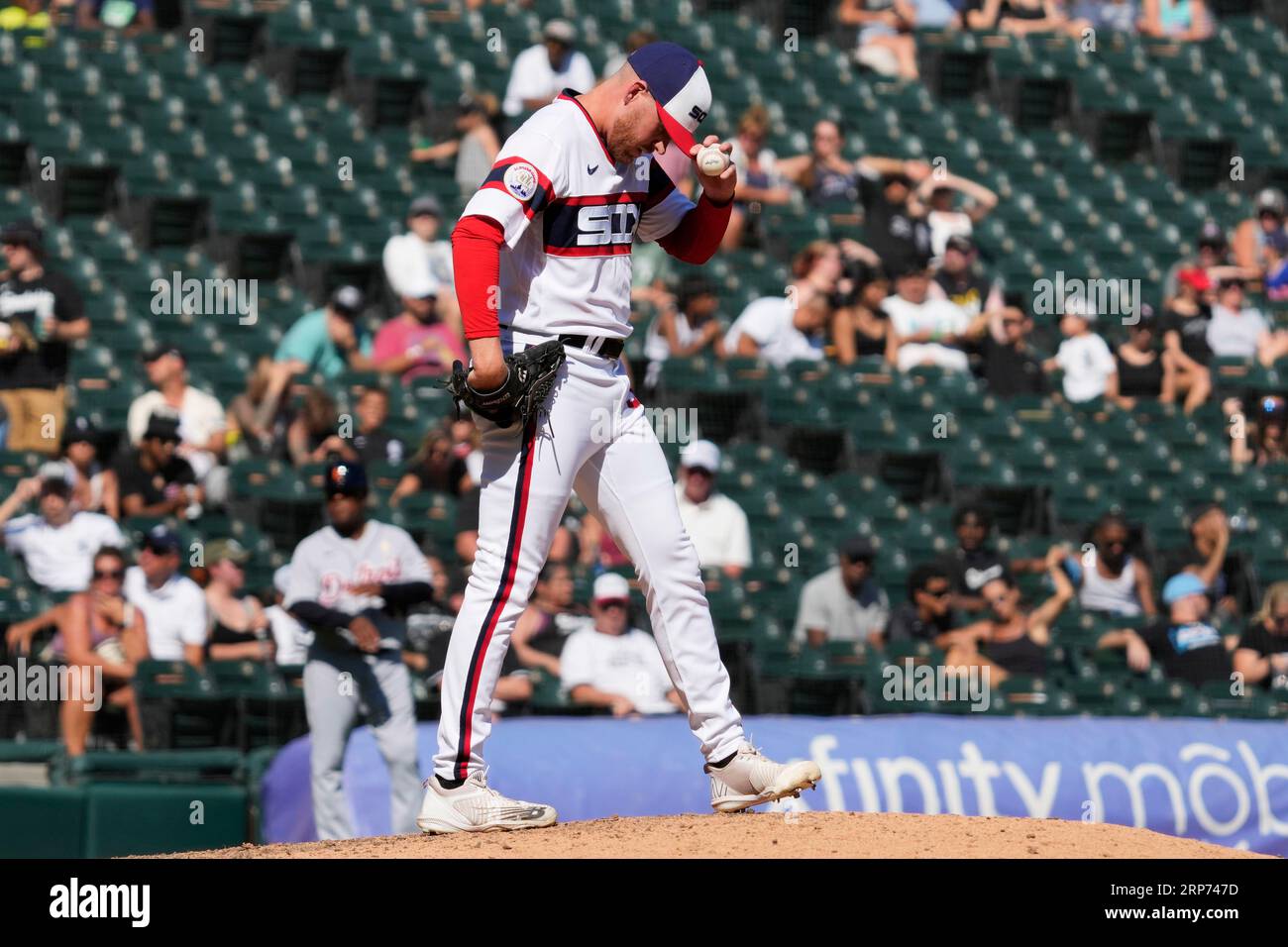 Chicago White Sox relief pitcher Aaron Bummer looks down after Detroit ...