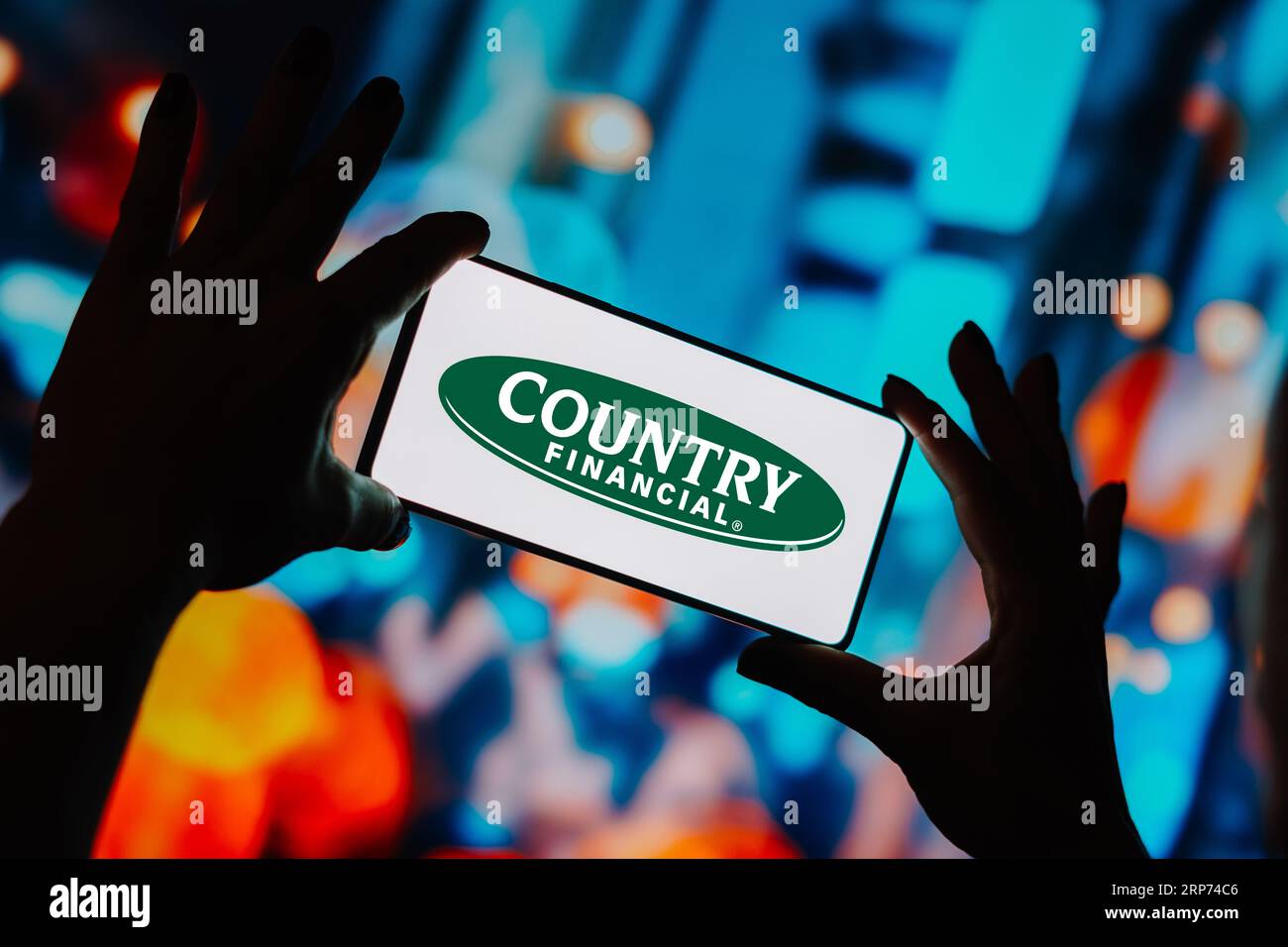 In this photo illustration, the COUNTRY Financial logo is displayed on ...