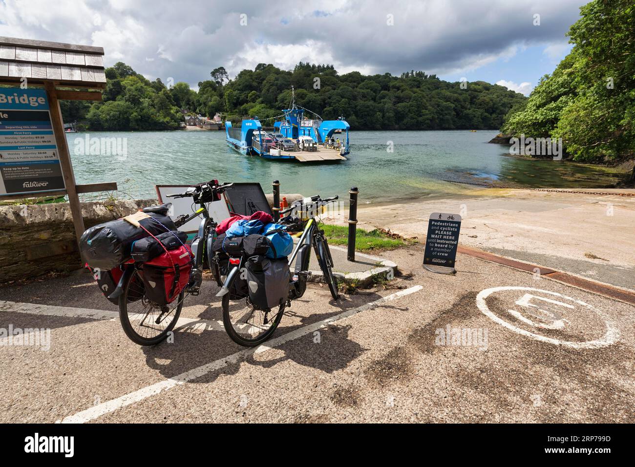 Two e-bikes, touring bikes at the King Harry Floating Bridge jetty ...