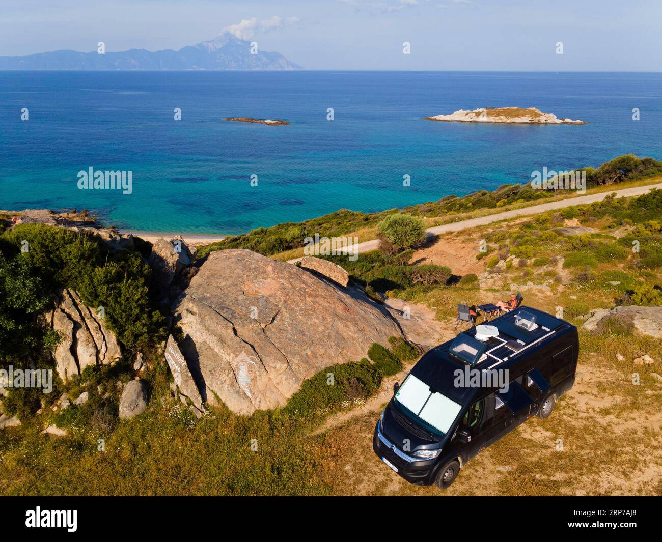 Aerial view, camper van and view of Mount Athos, Orthodox monastic ...