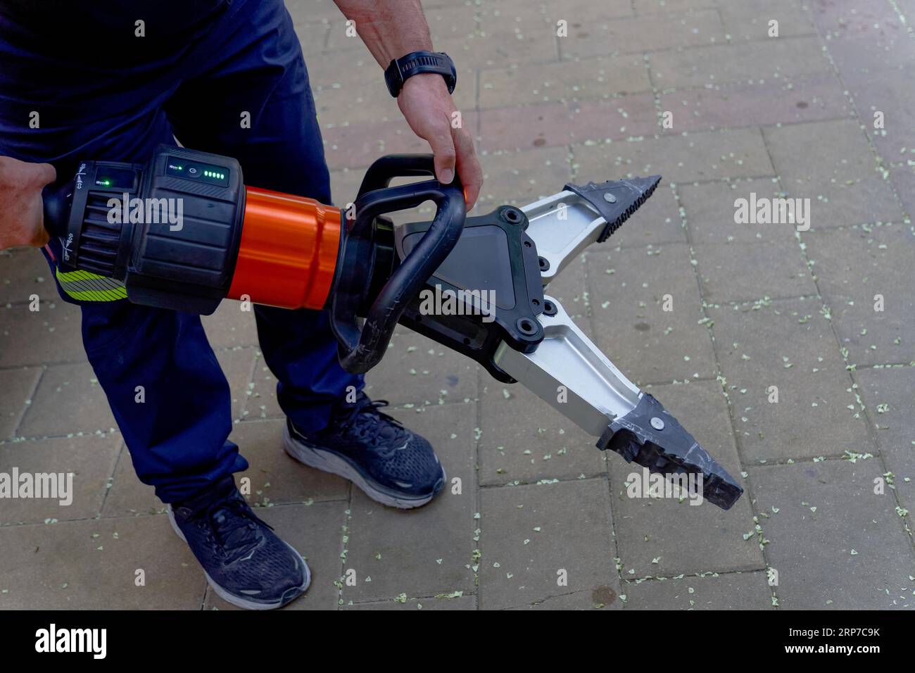 Firefighter with a spreader, rescue tool for traffic accidents Stock ...