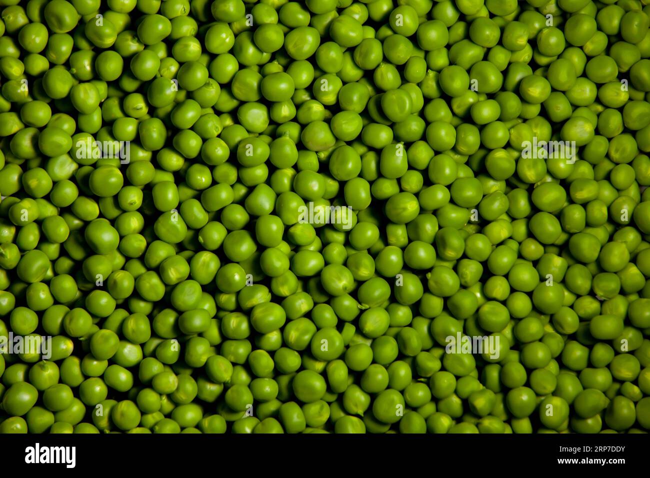 Tasty texture of green peas. Top view. Green natural background Stock ...