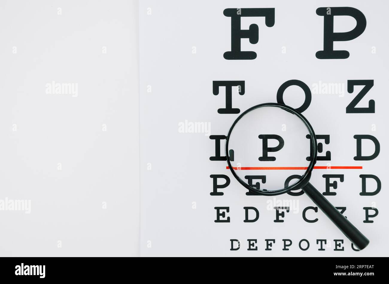 Selection letters magnifying glass Stock Photo - Alamy