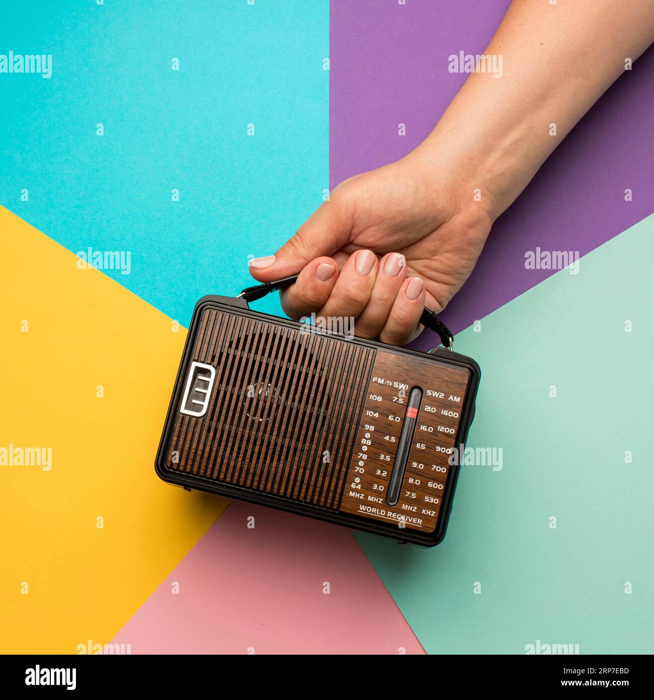 Person holding retro broadcast radio receiver Stock Photo - Alamy