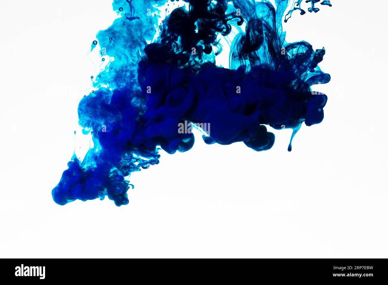 Rich blue colored ink droplet Stock Photo - Alamy