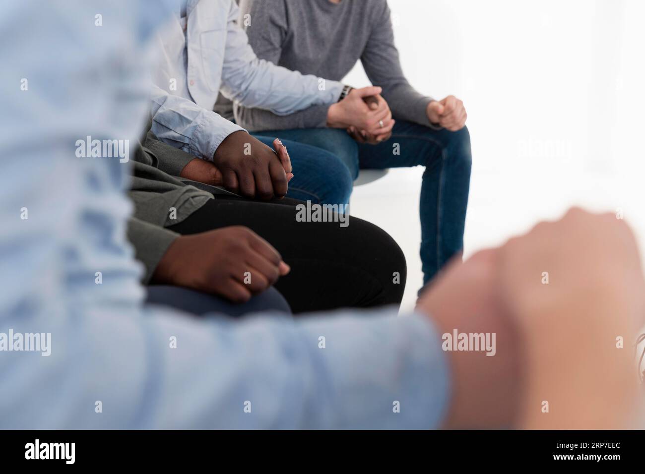 Rehab patients hands holding together Stock Photo - Alamy
