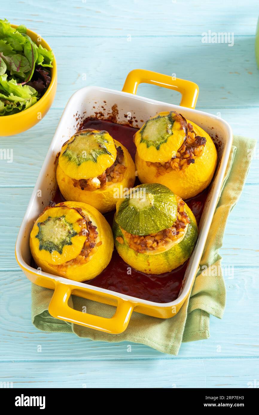 Eight-Ball zucchini stuffed with meat, bulgur and vegetables Stock ...