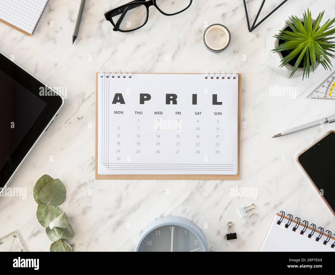 Top view desk april calendar Stock Photo - Alamy