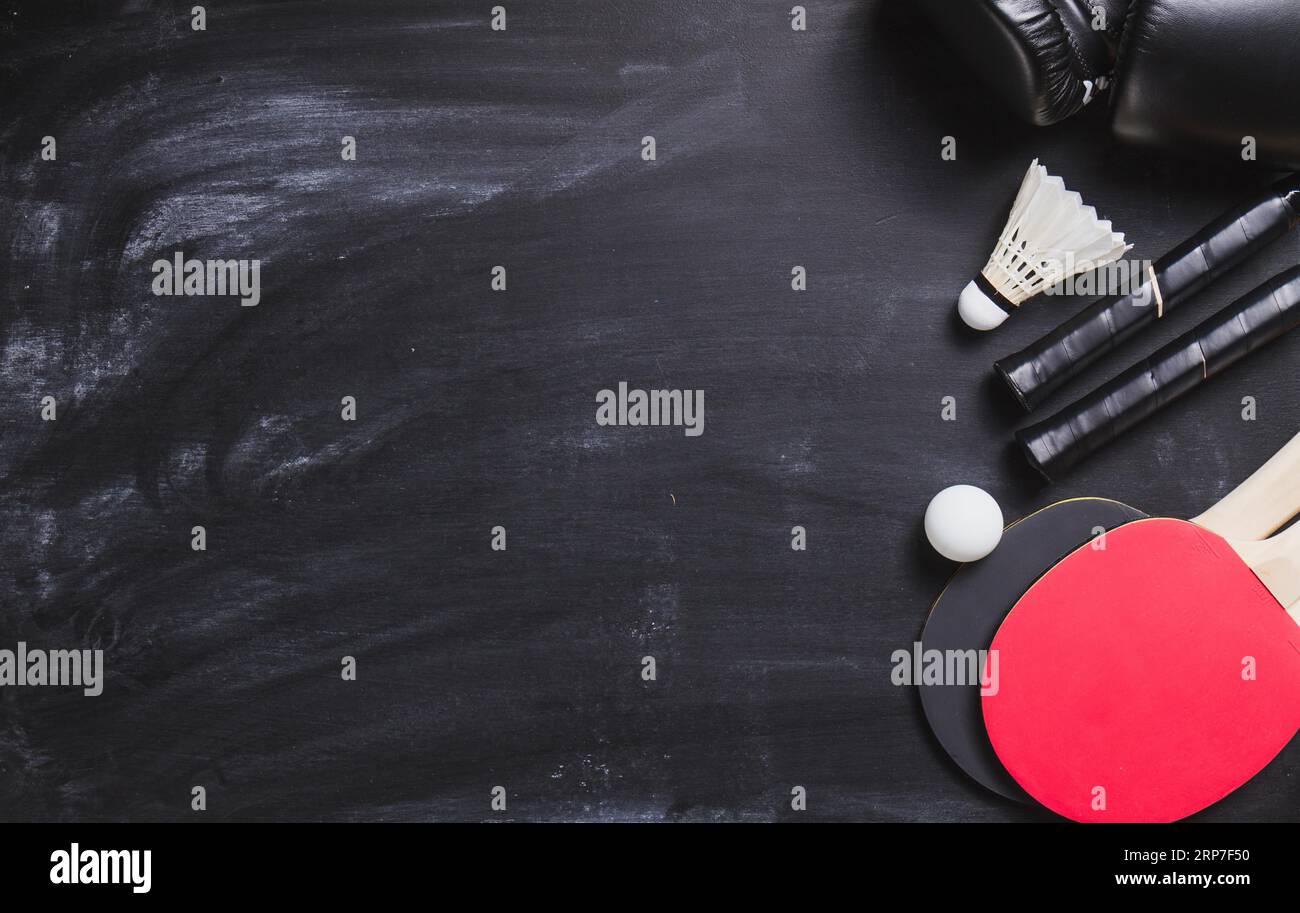 Blackboard background with ping pong rackets ball Stock Photo - Alamy