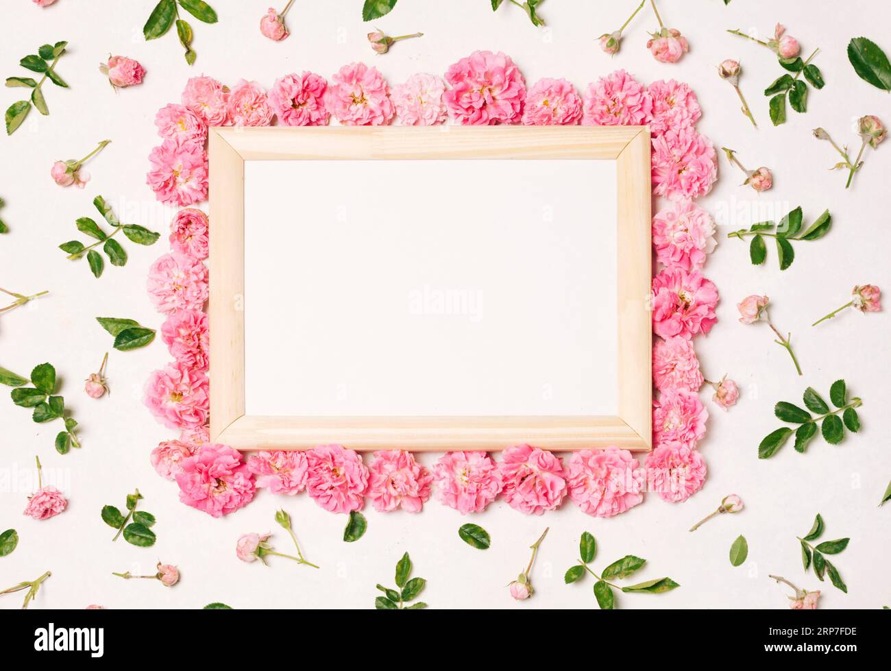 Frame set pink flowers green leaves Stock Photo - Alamy