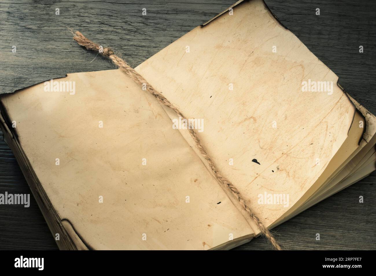 Linen bookmark old notebook Stock Photo - Alamy