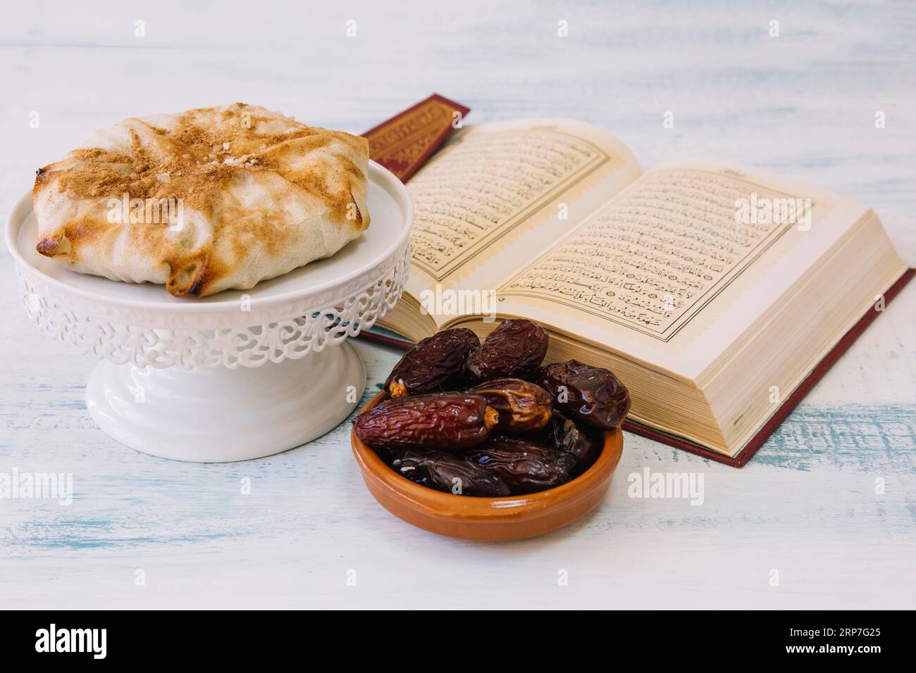 Arabian food composition ramadan quran Stock Photo - Alamy