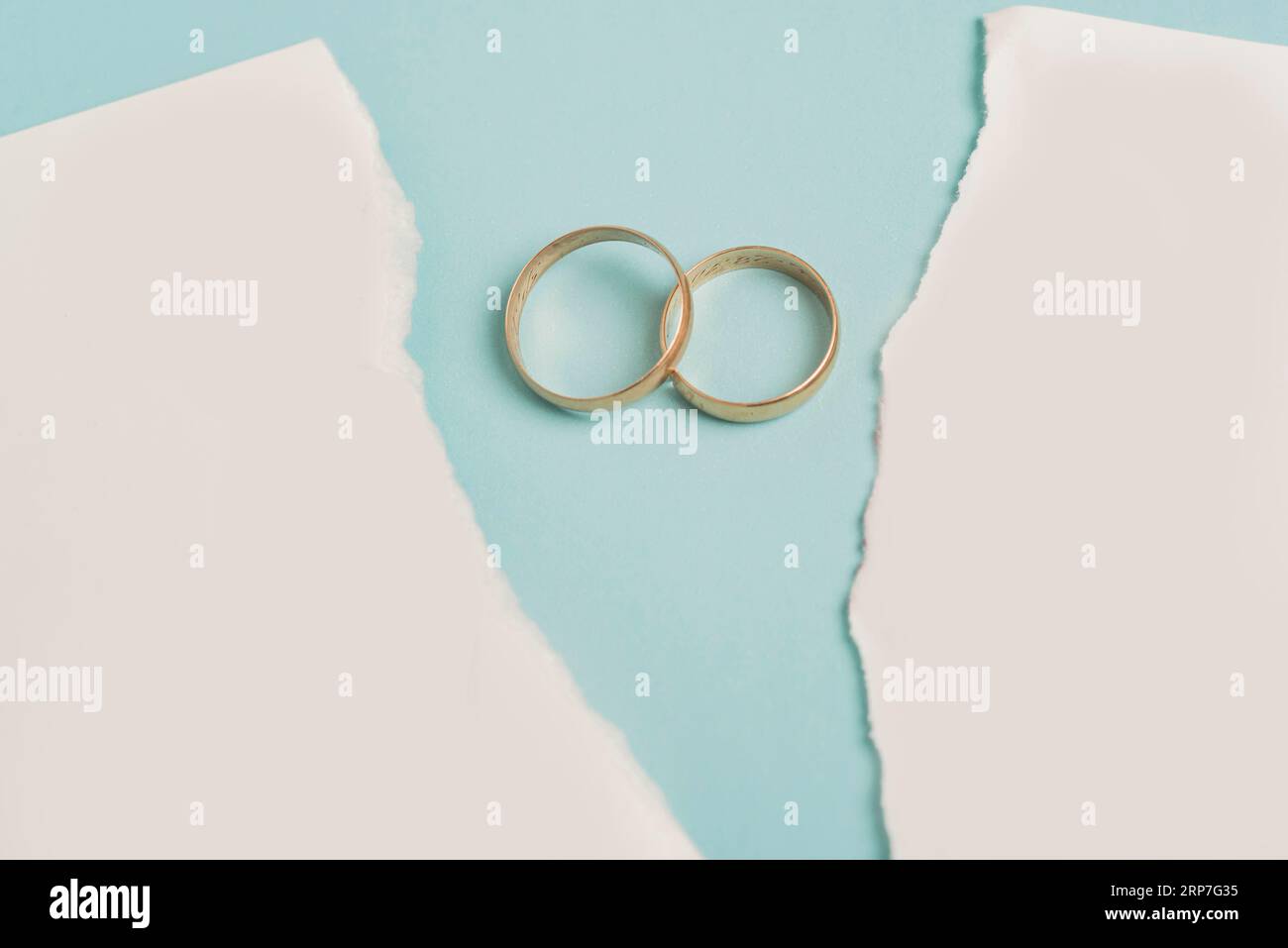 Broken paper wedding rings Stock Photo - Alamy