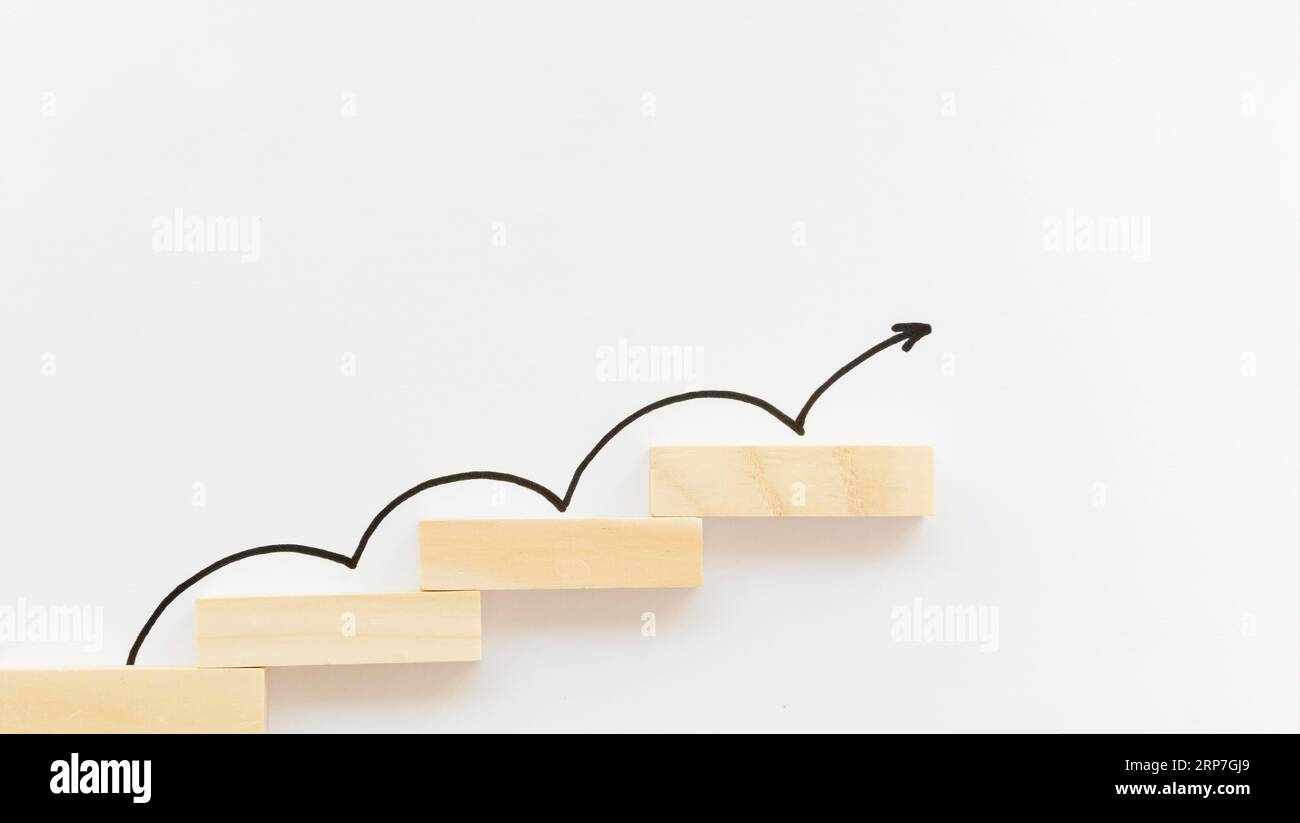 Drawn arrow bouncing off blocks Stock Photo - Alamy